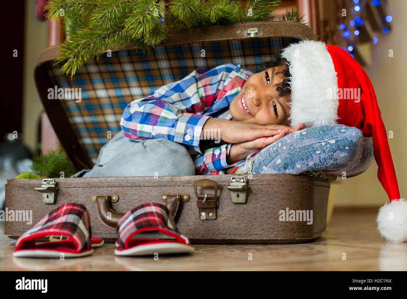 Little Santa's morning smile Stock Photo - Alamy