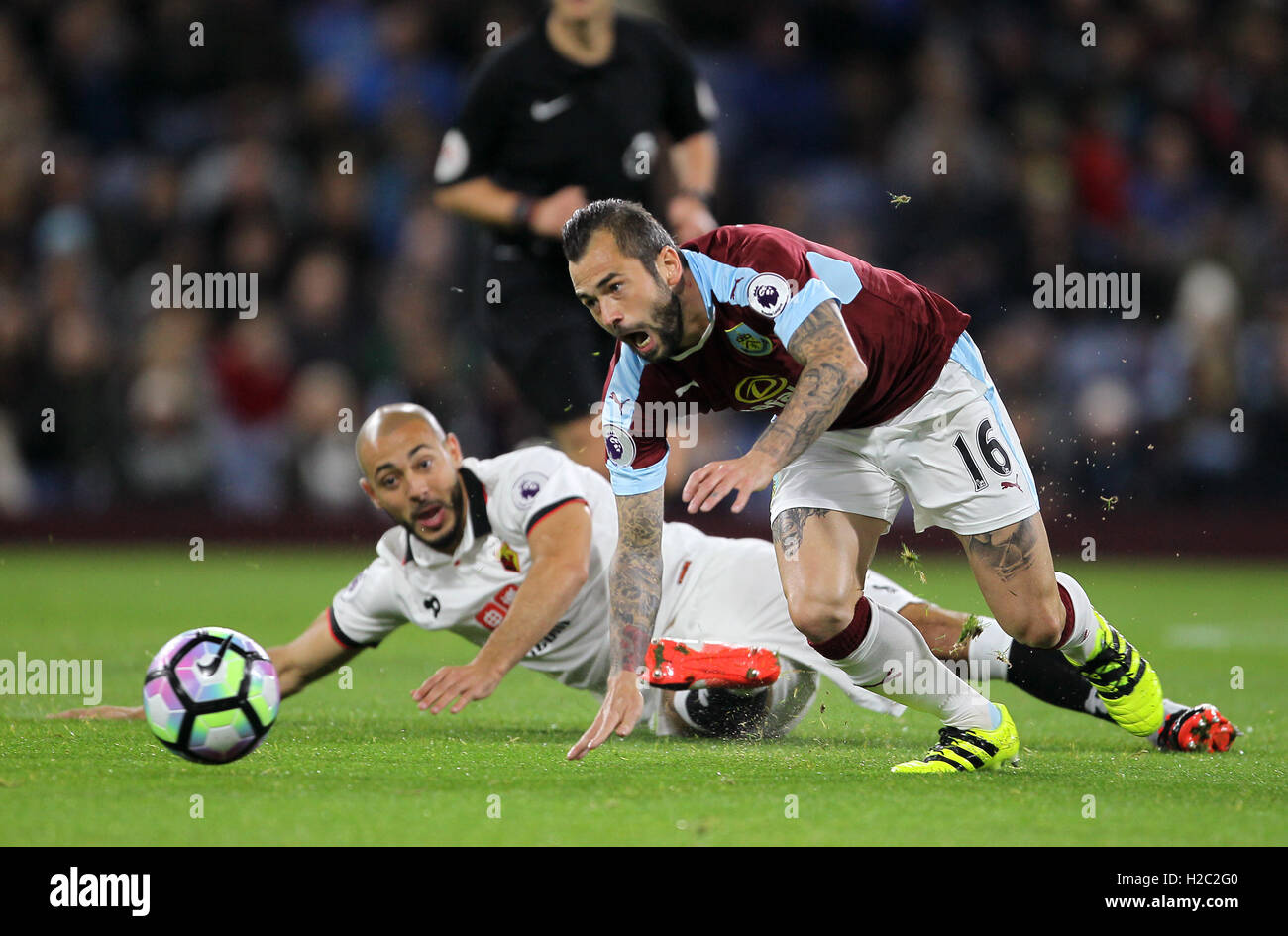 Burnley's Steven Defour (right) and Watford's Nordin Amrabat battle for ...