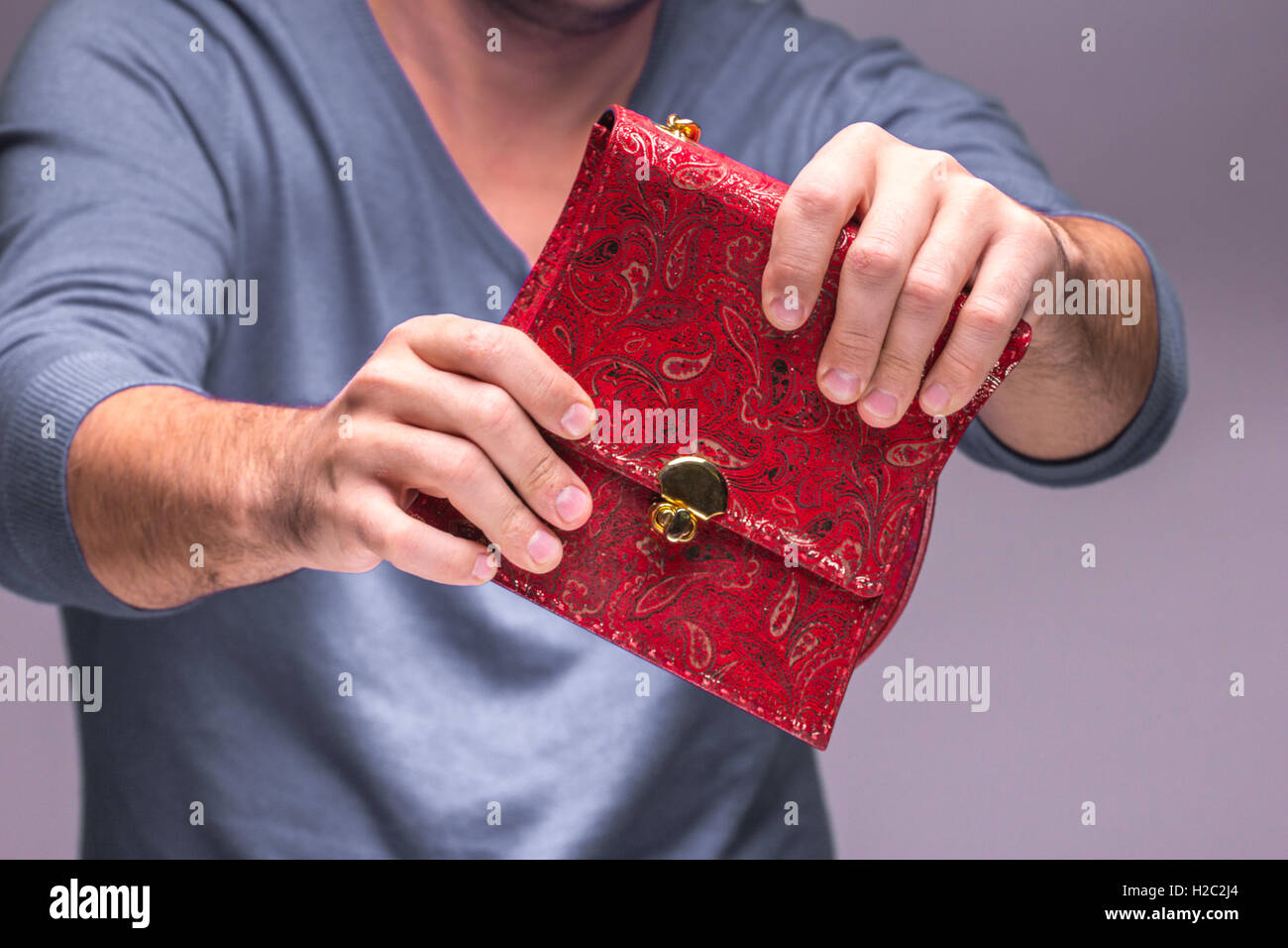 Modern blue bag in male hands Stock Photo - Alamy