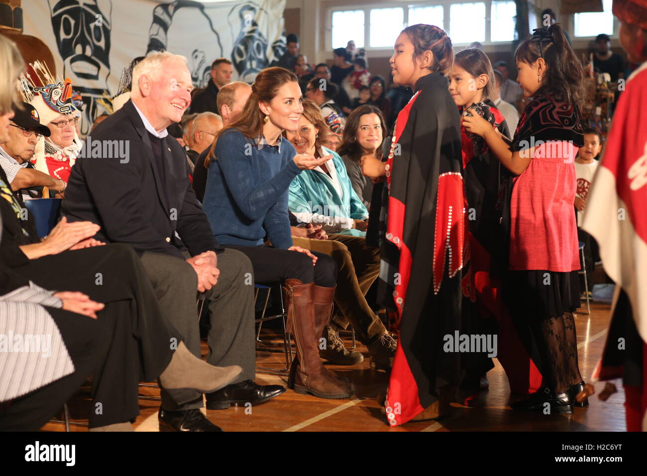 The Duke and Duchess of Cambridge are greeted with a traditional ...