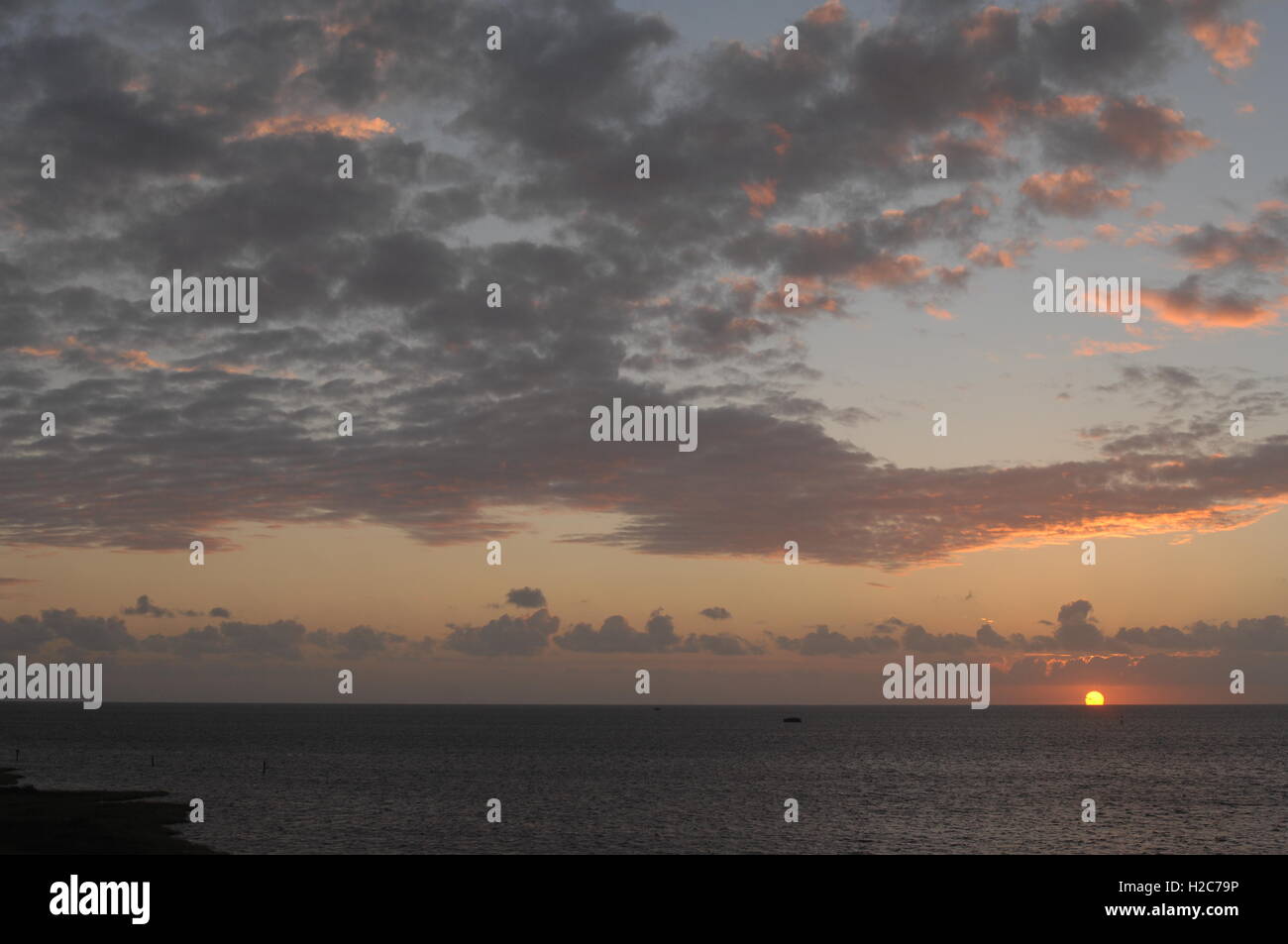 sunset sunrise sun lit setting sun sky with clouds dramatic lighting ...