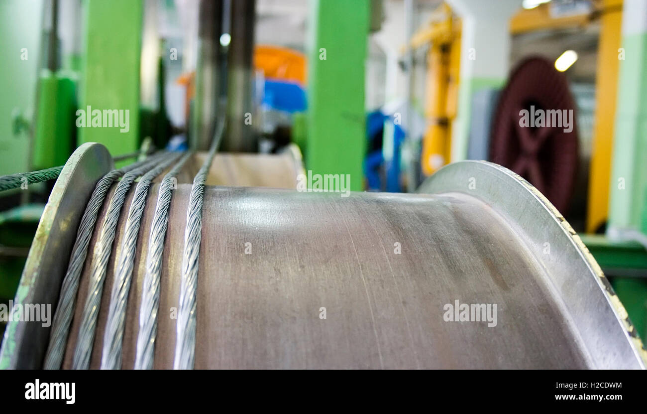 Steel hawser manufacturing process. Hawser on reel is visible closeup ...