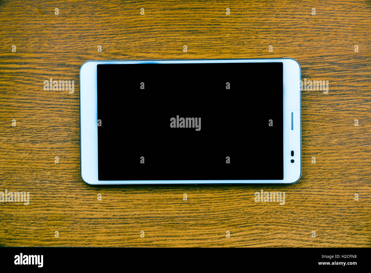 Office desk with tablet computer Stock Photo - Alamy