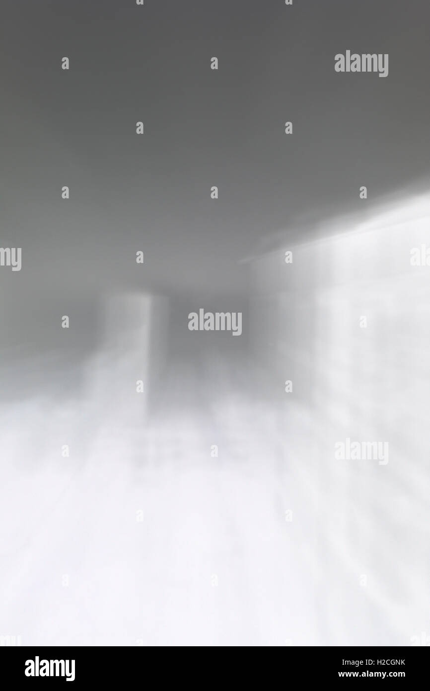 Negative apartment building motion blur. White and grey Stock Photo - Alamy
