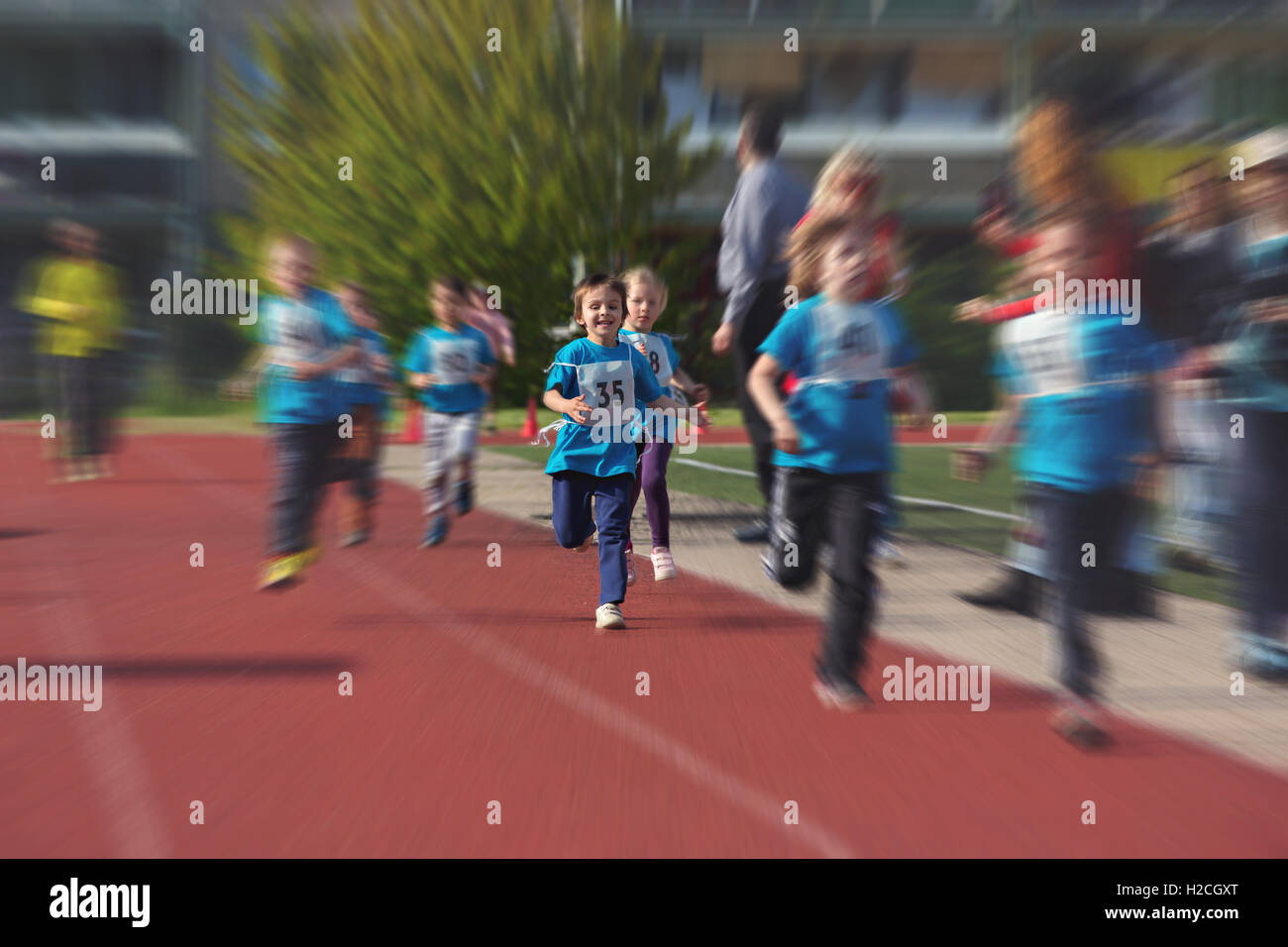 Marathon runner with children hi-res stock photography and images - Alamy