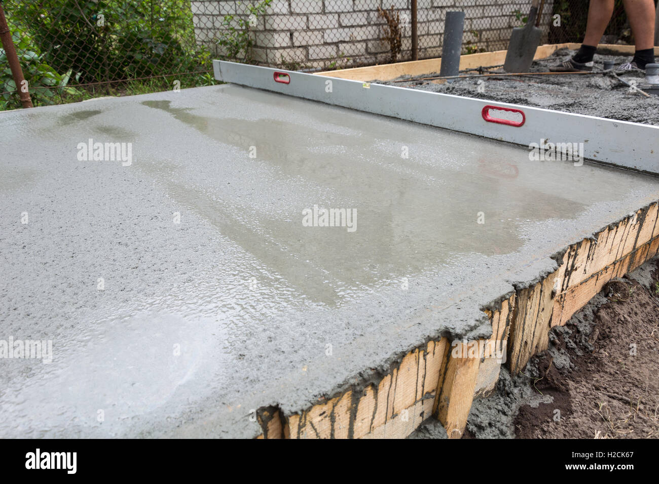 establishment of horizontal level in concrete works Stock Photo - Alamy
