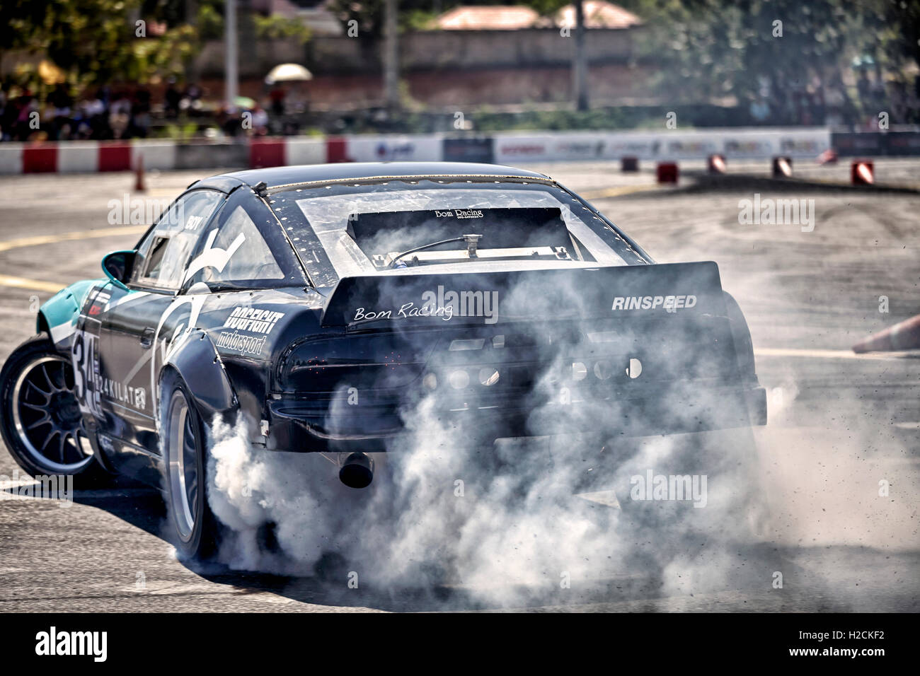 Car drifting auto racing event action with smoking tyres. Pattaya ...