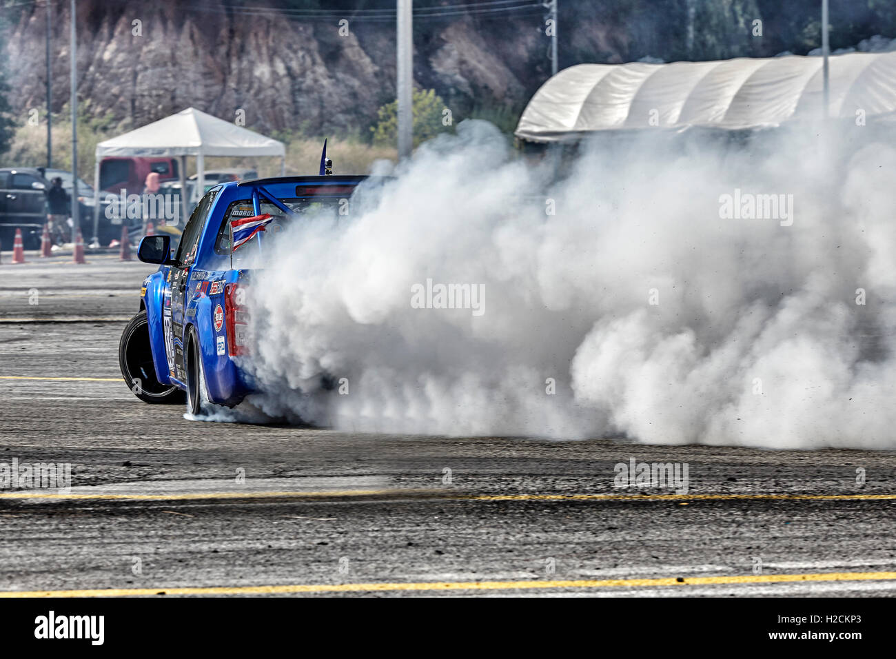 Car drifting auto racing event action with smoking tyres. Pattaya ...
