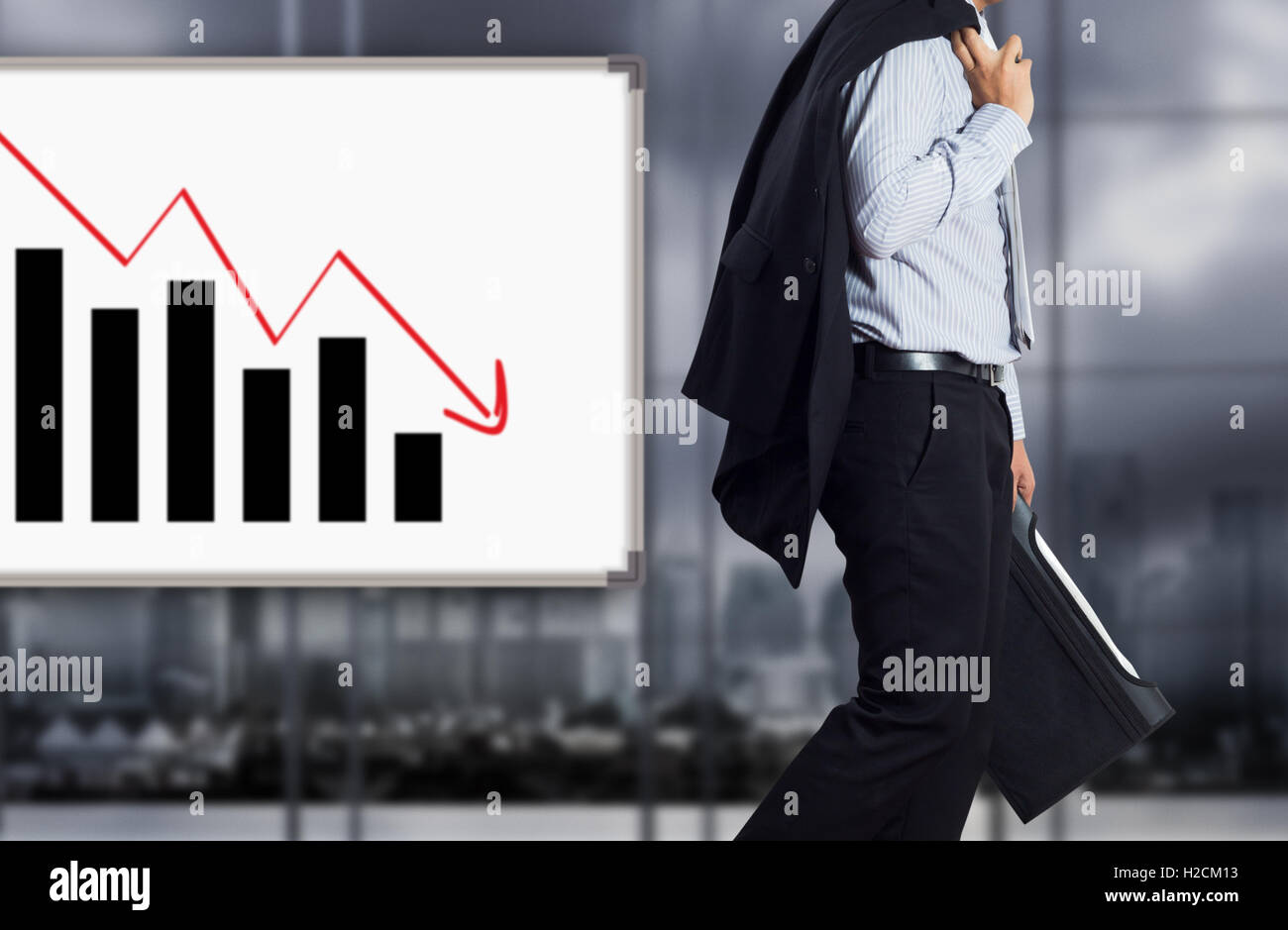 decreasing graph with businessman Stock Photo - Alamy