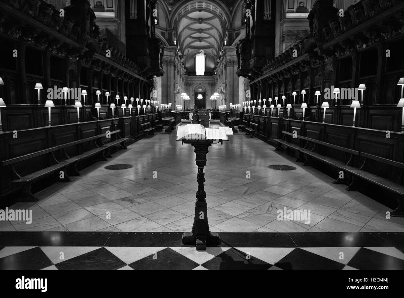Choir stalls and bible on a wooden carved stand at St. Paul's Cathedral ...
