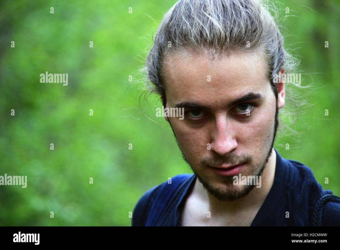 Long black hair pulled hi-res stock photography and images - Alamy