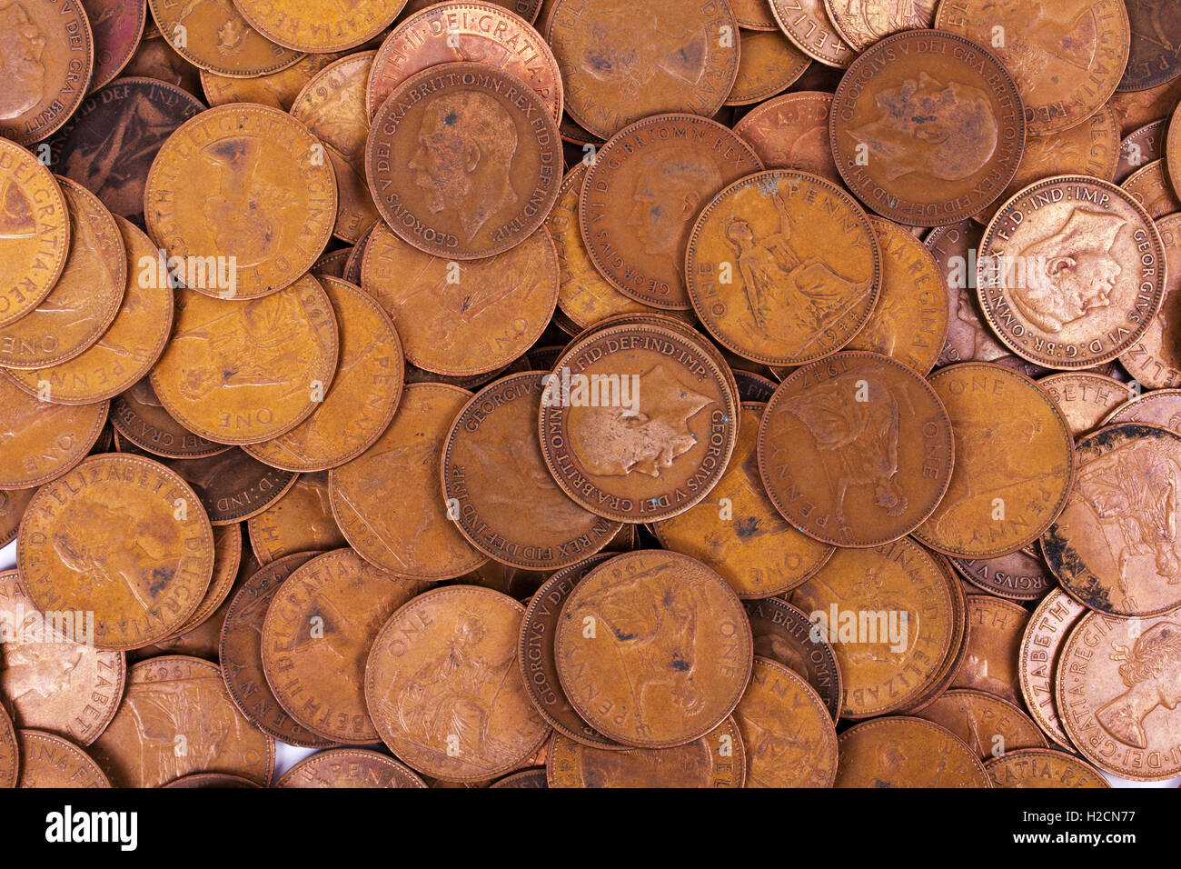 Old penny coins spread out for a background Stock Photo - Alamy