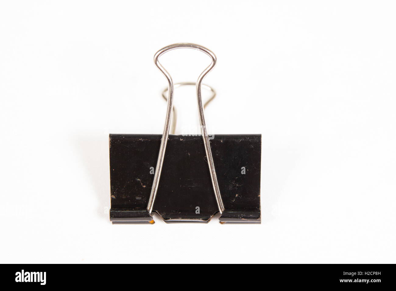 old paper clip isolated on white background Stock Photo - Alamy