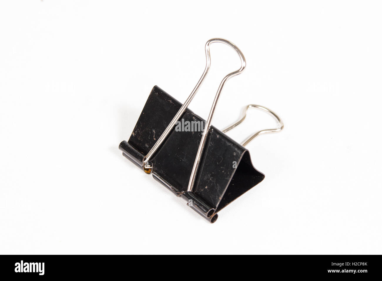 old paper clip isolated on white background Stock Photo - Alamy