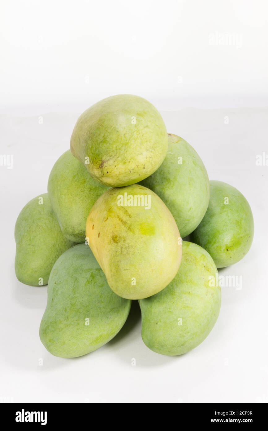 Green mango isolated on white background Stock Photo - Alamy