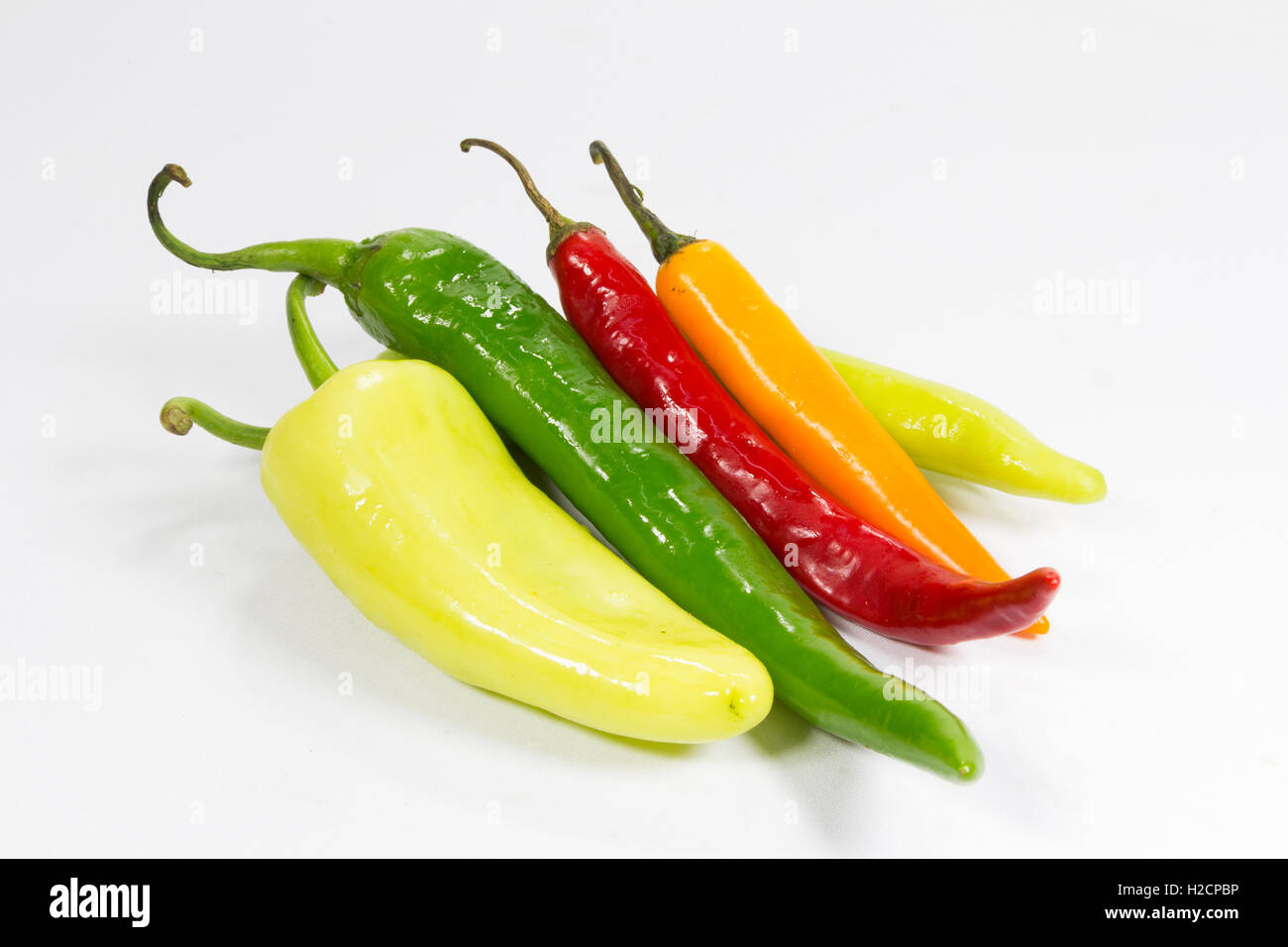 the color of chili on white background Stock Photo - Alamy