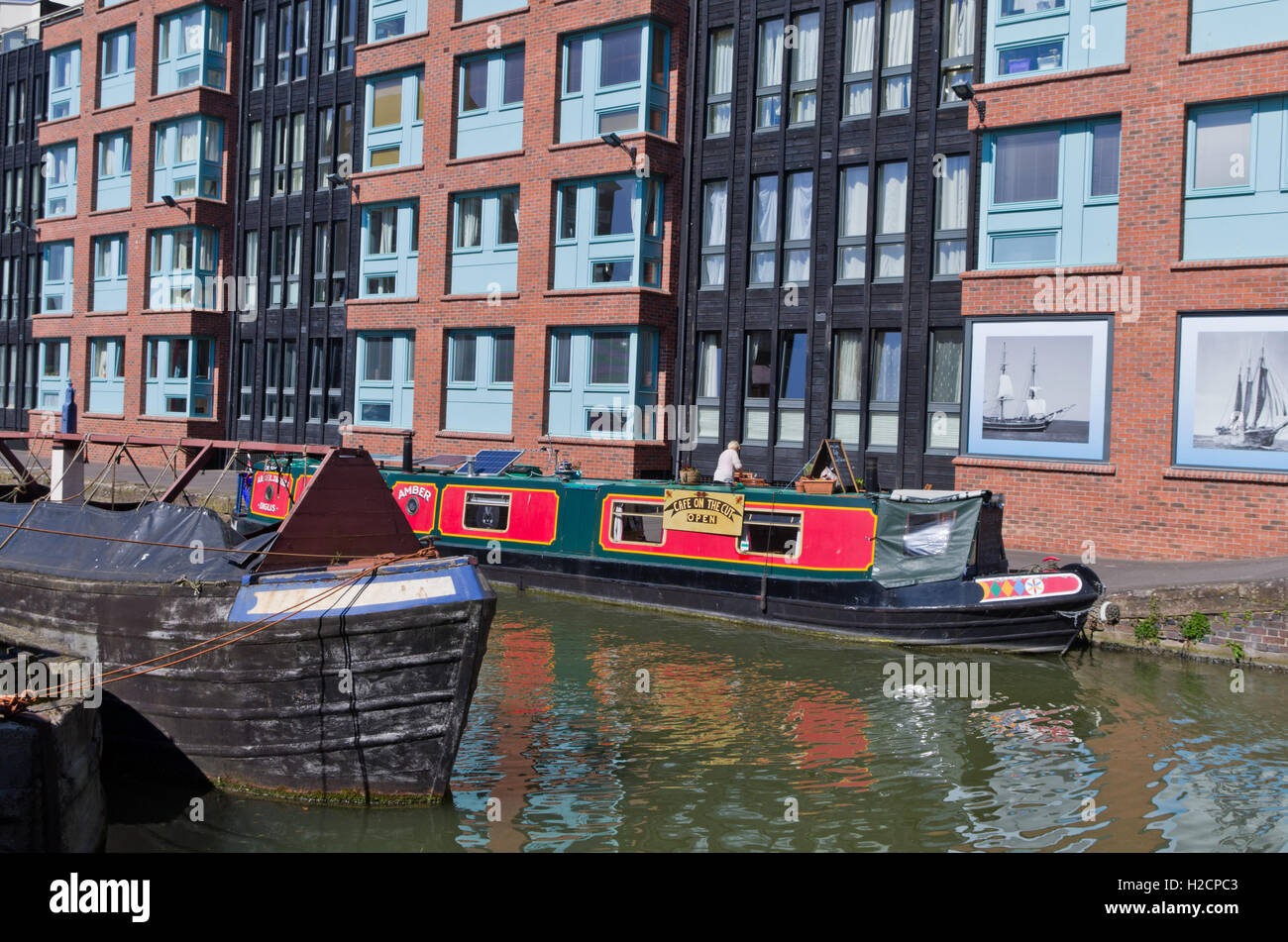 A floating cafe, Cafe On The Cut, moored in the historic docks at ...