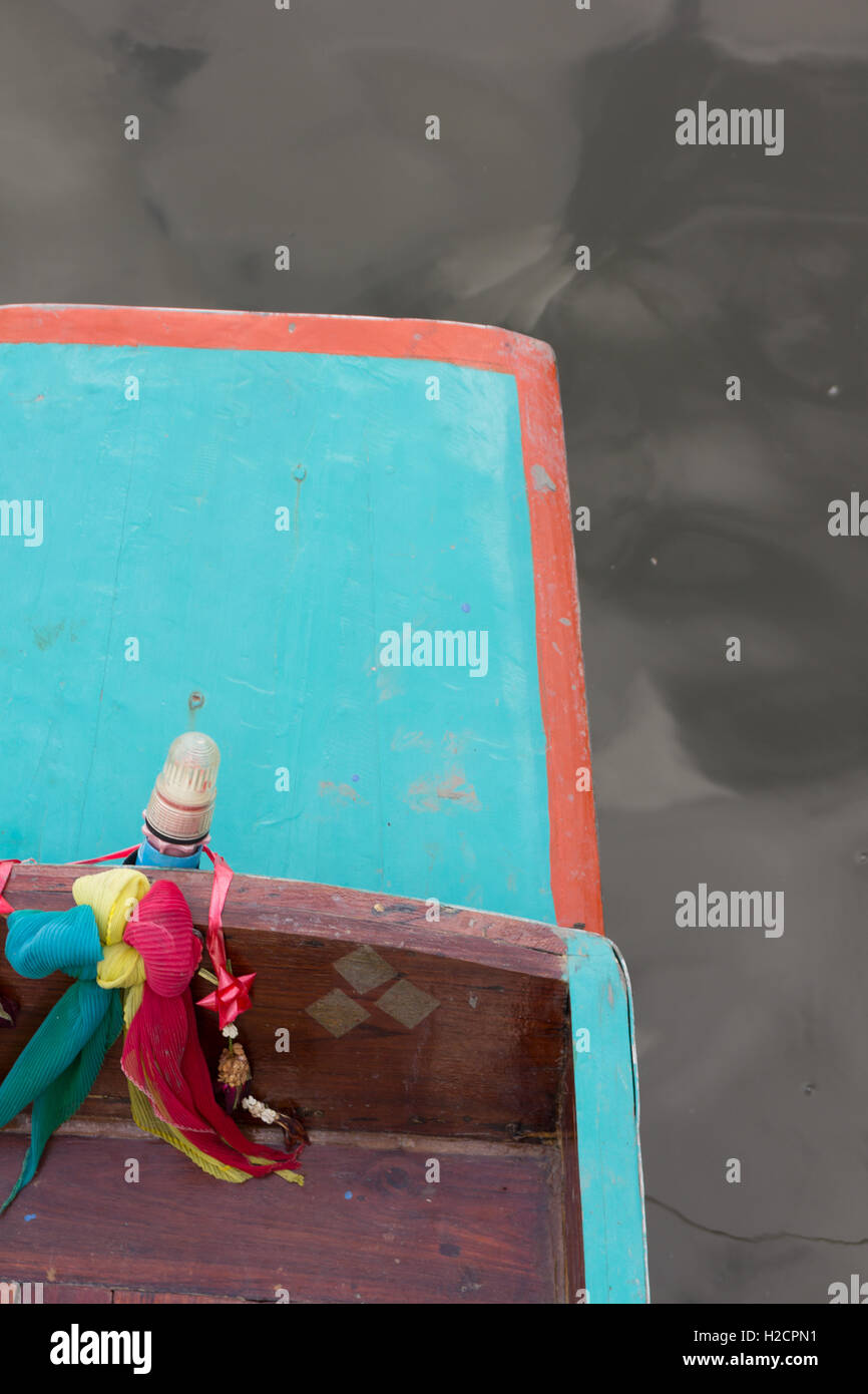 Prow of the long tail boat on water Stock Photo - Alamy