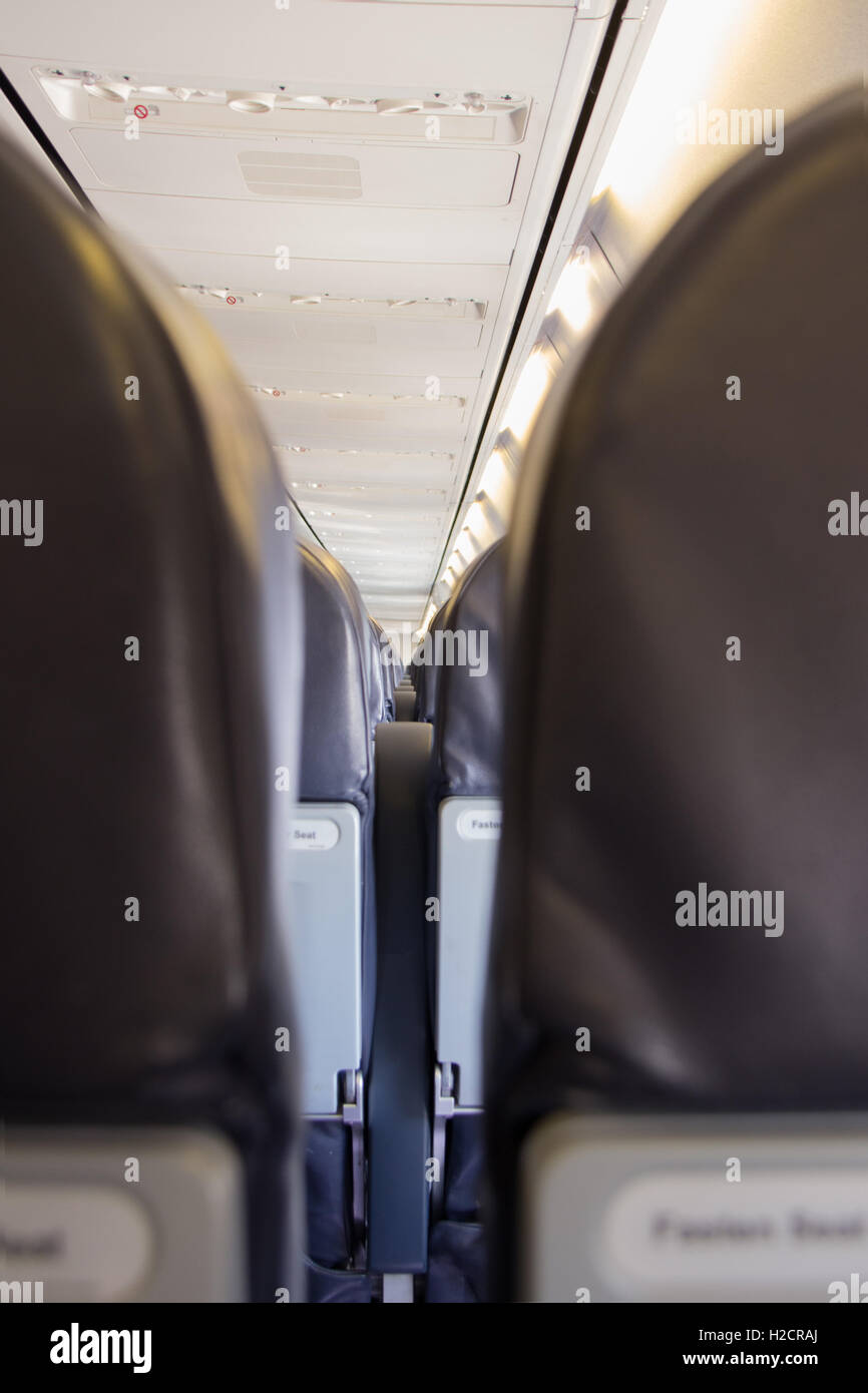 Empty airplane seats in the cabin Stock Photo - Alamy