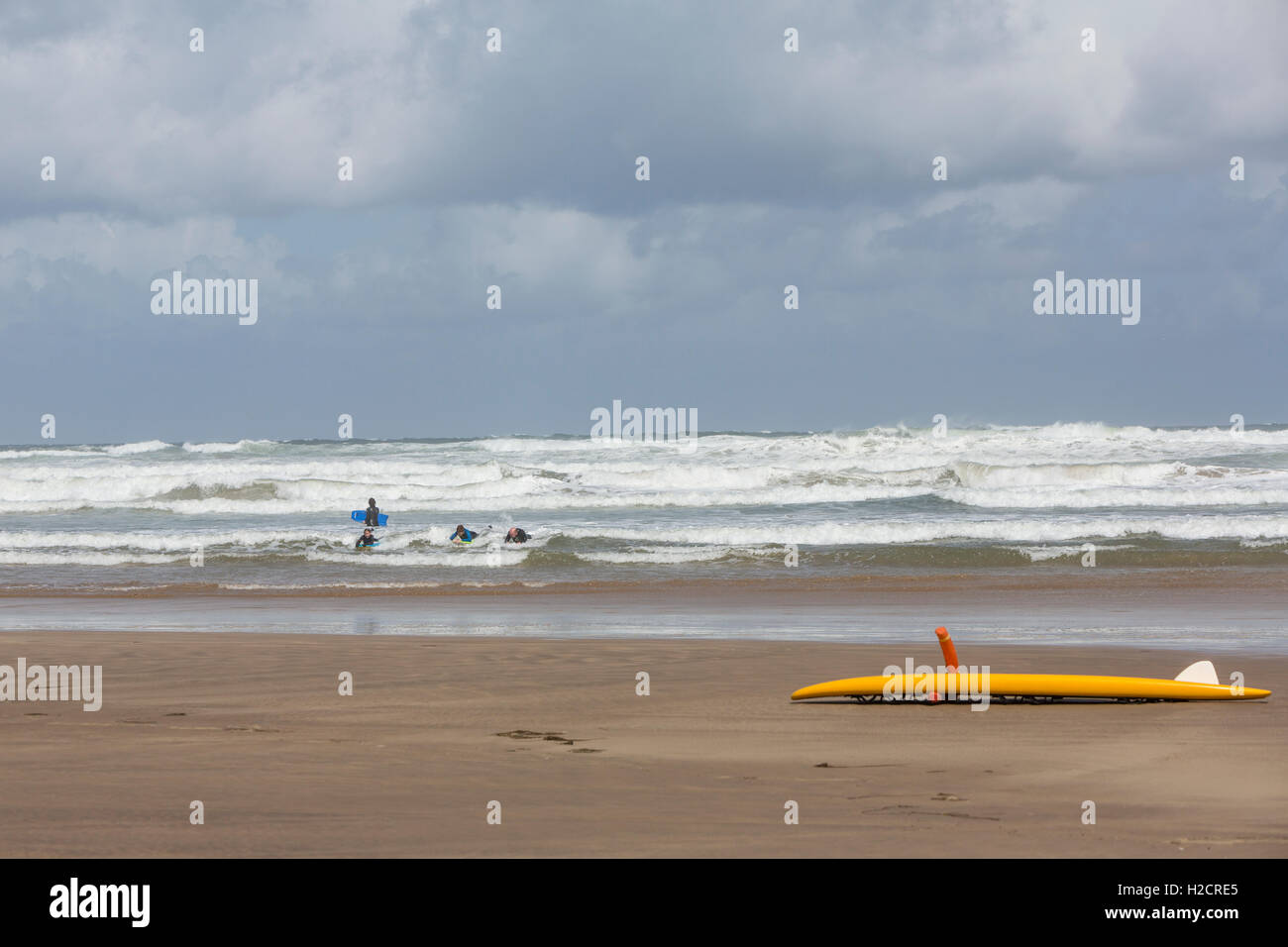 Boys learning surf and lifeguards surf board and cone Waterways ...