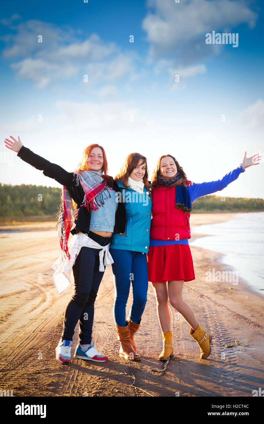 Women have fun near lake Stock Photo - Alamy