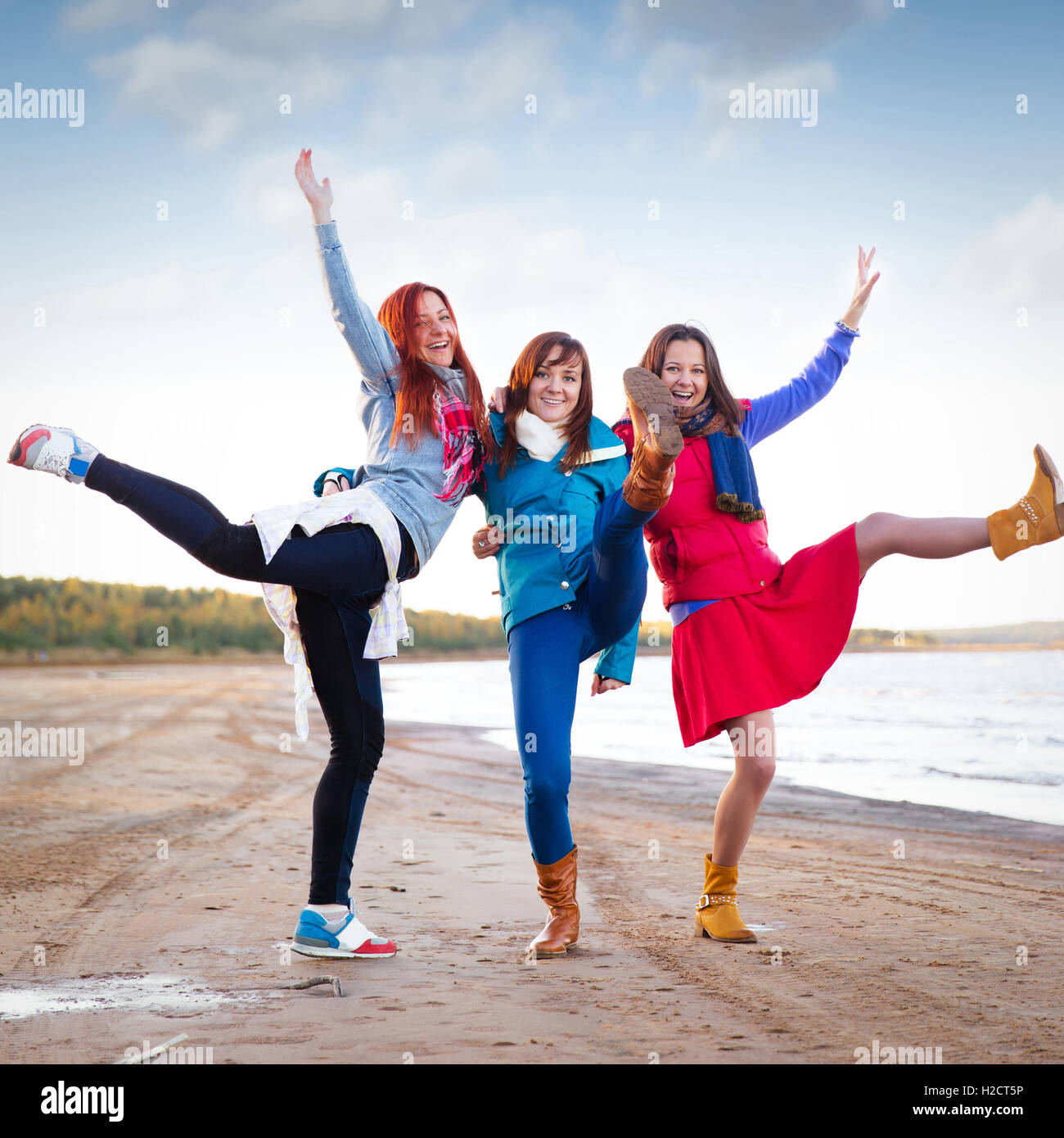 Women have fun near lake Stock Photo - Alamy