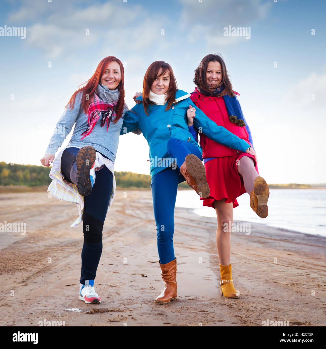 Women have fun near lake Stock Photo - Alamy