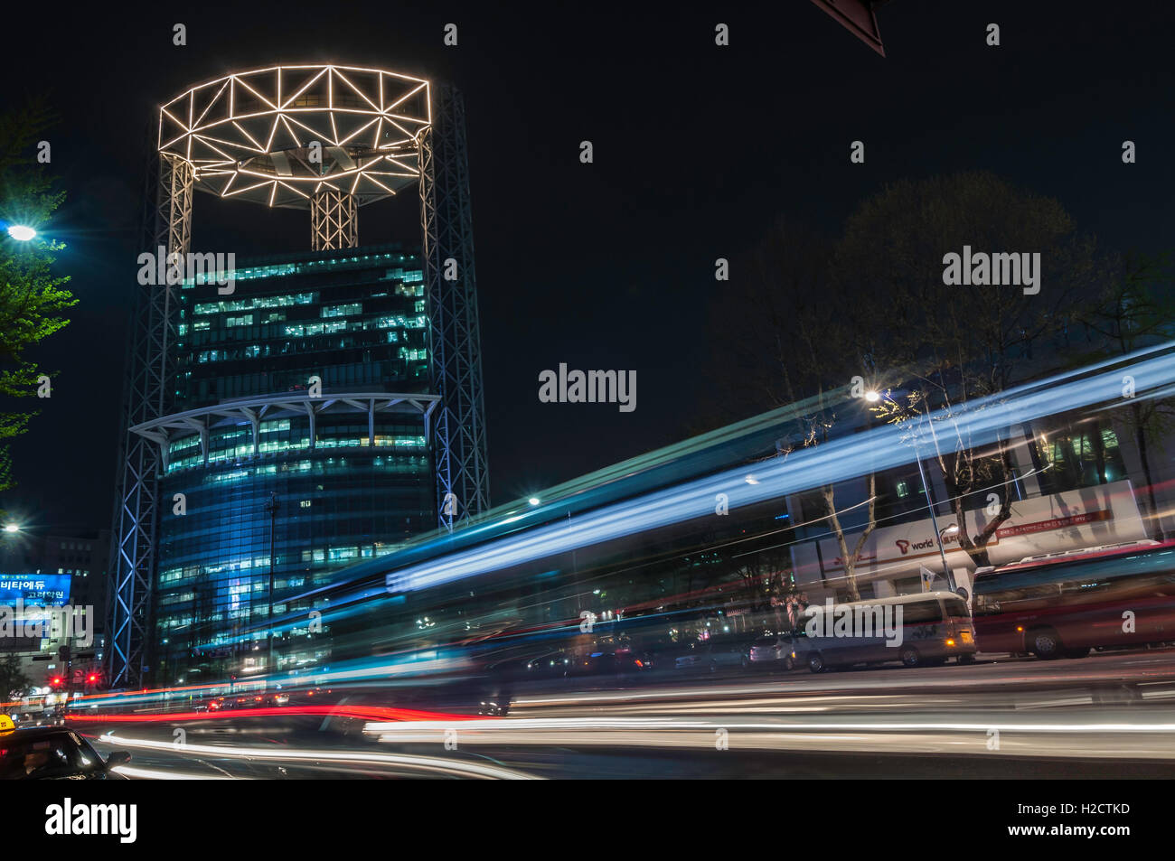 Motion blue of traffic passing Jongno Tower at night, Jongno, Seoul ...