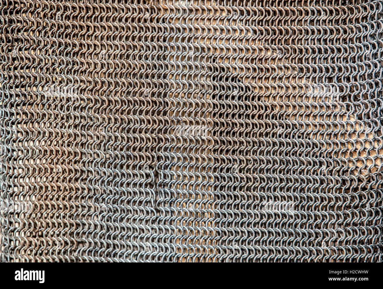 Metallic silver coat of mail full of rings. Textured background Stock ...