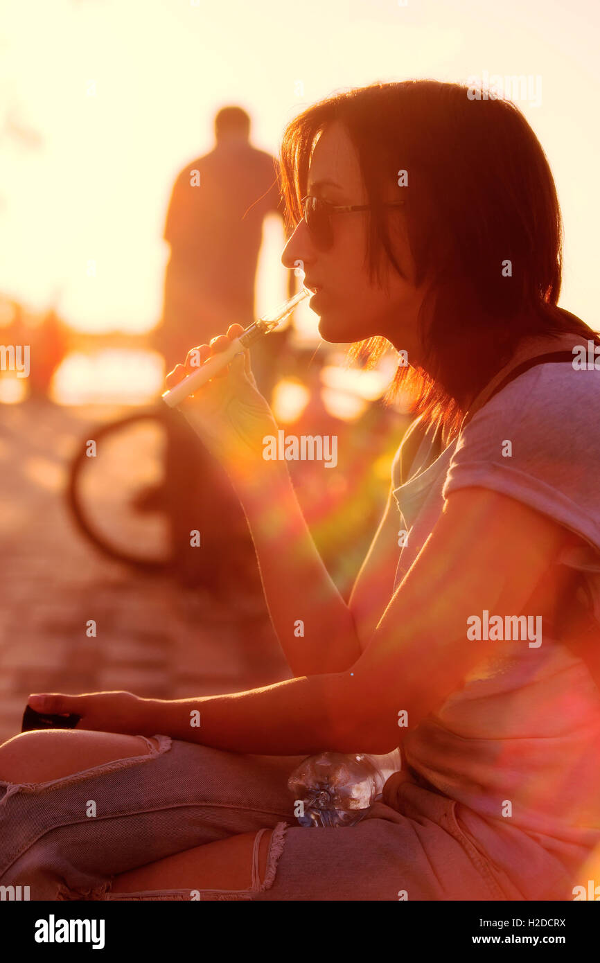 Vaping sunset silhouette hi-res stock photography and images - Alamy