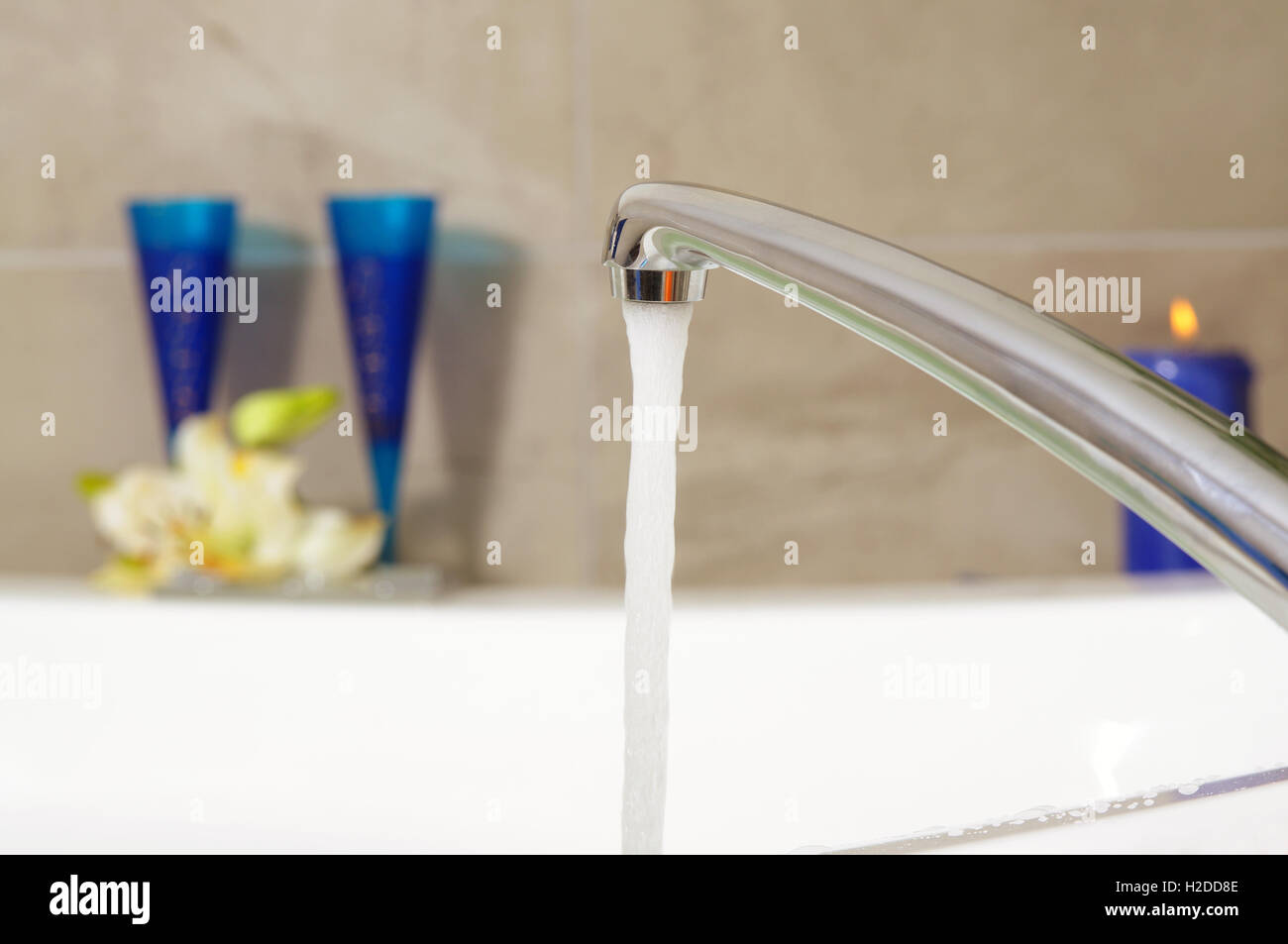 open water tap with running water in spa salon Stock Photo - Alamy