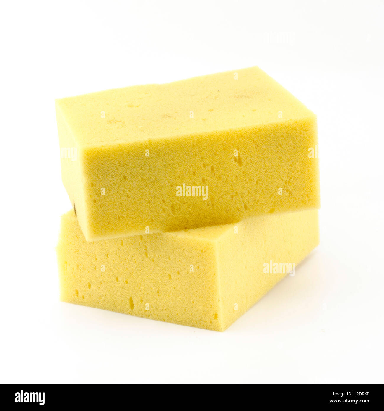 two piece yellow household sponge isolated on white background Stock ...