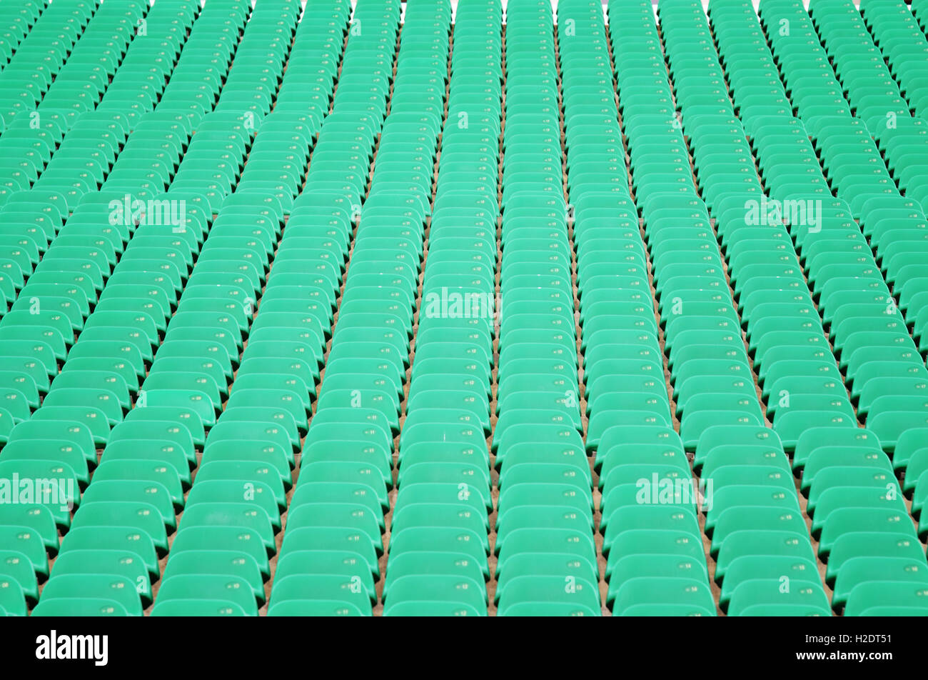 Stadium seat in green Stock Photo - Alamy