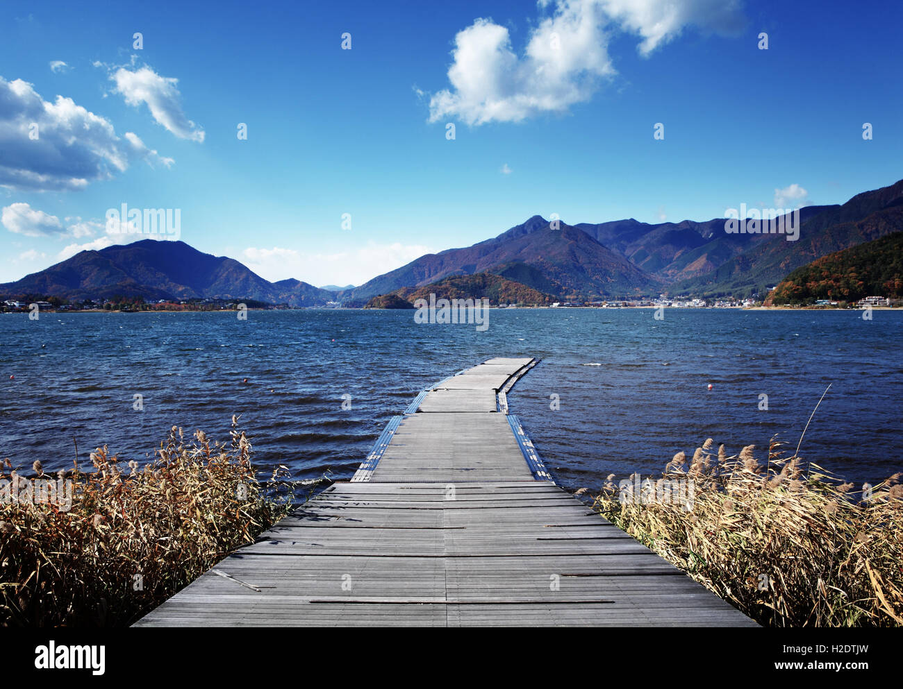 Wooden path to lake Stock Photo - Alamy