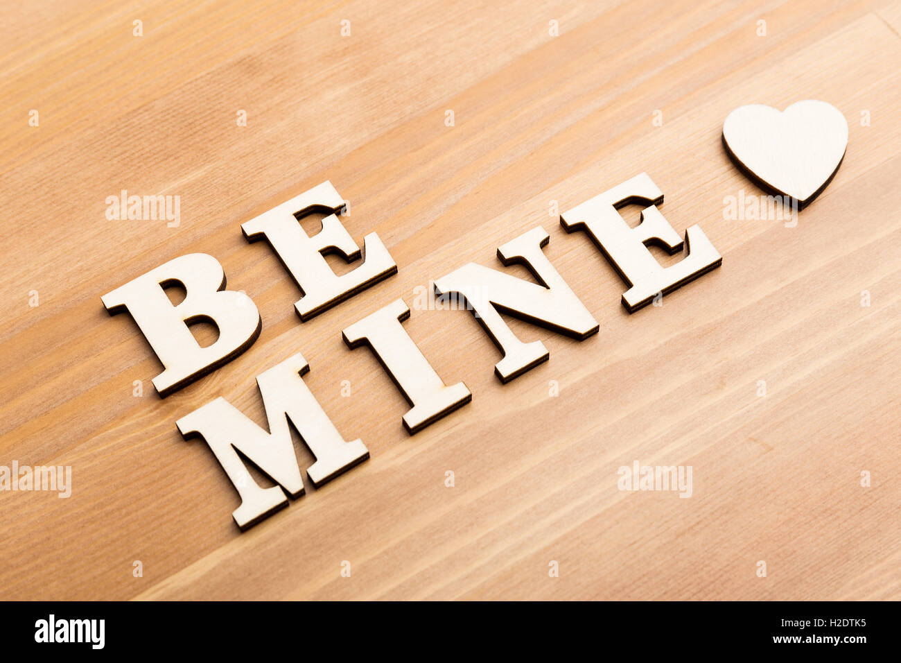 Be mine wooden letters Stock Photo - Alamy