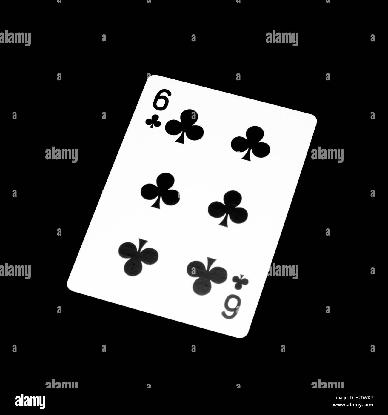 number six clover card isolated on black Stock Photo - Alamy