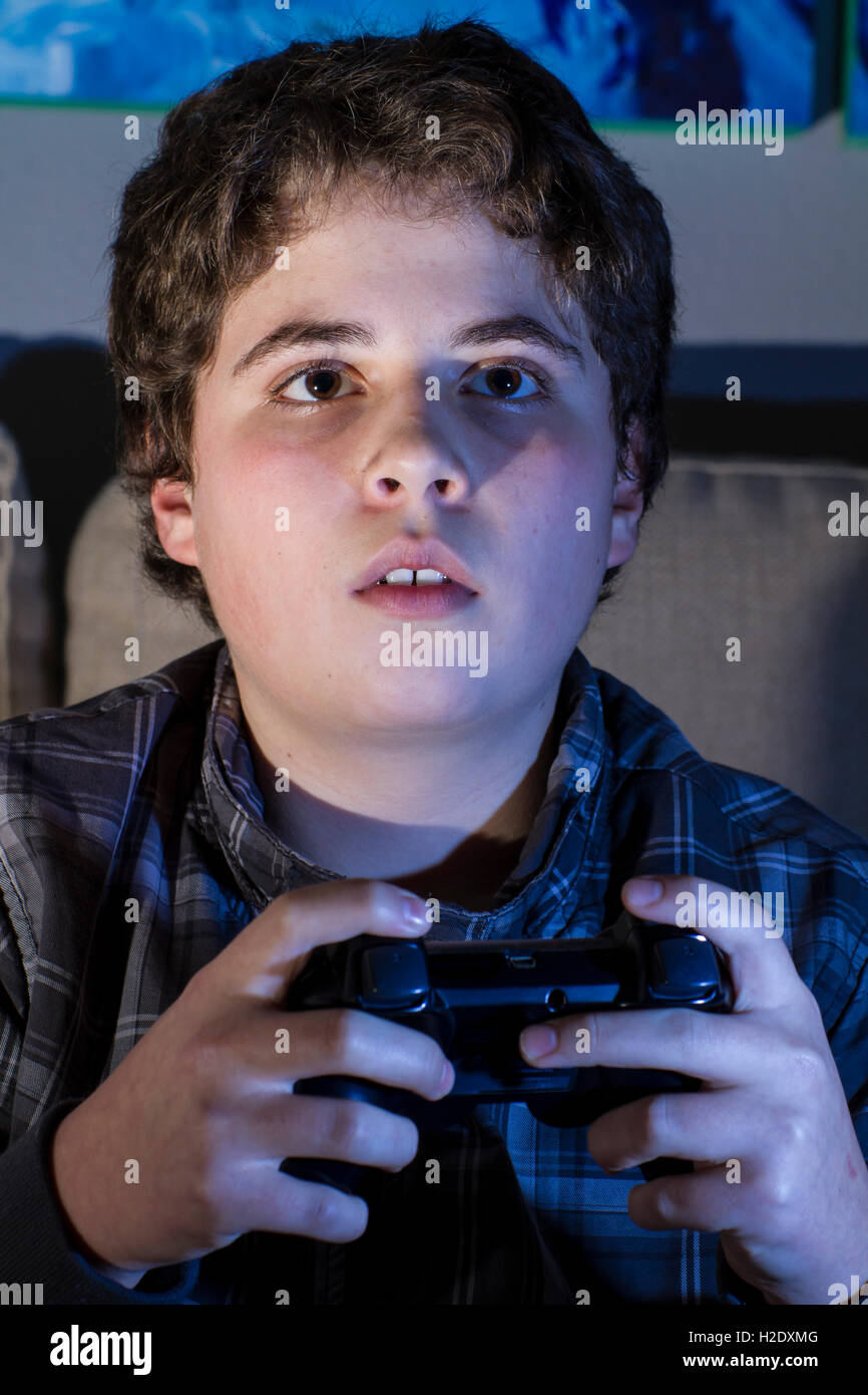 boy with joystick playing computer game at home Stock Photo - Alamy