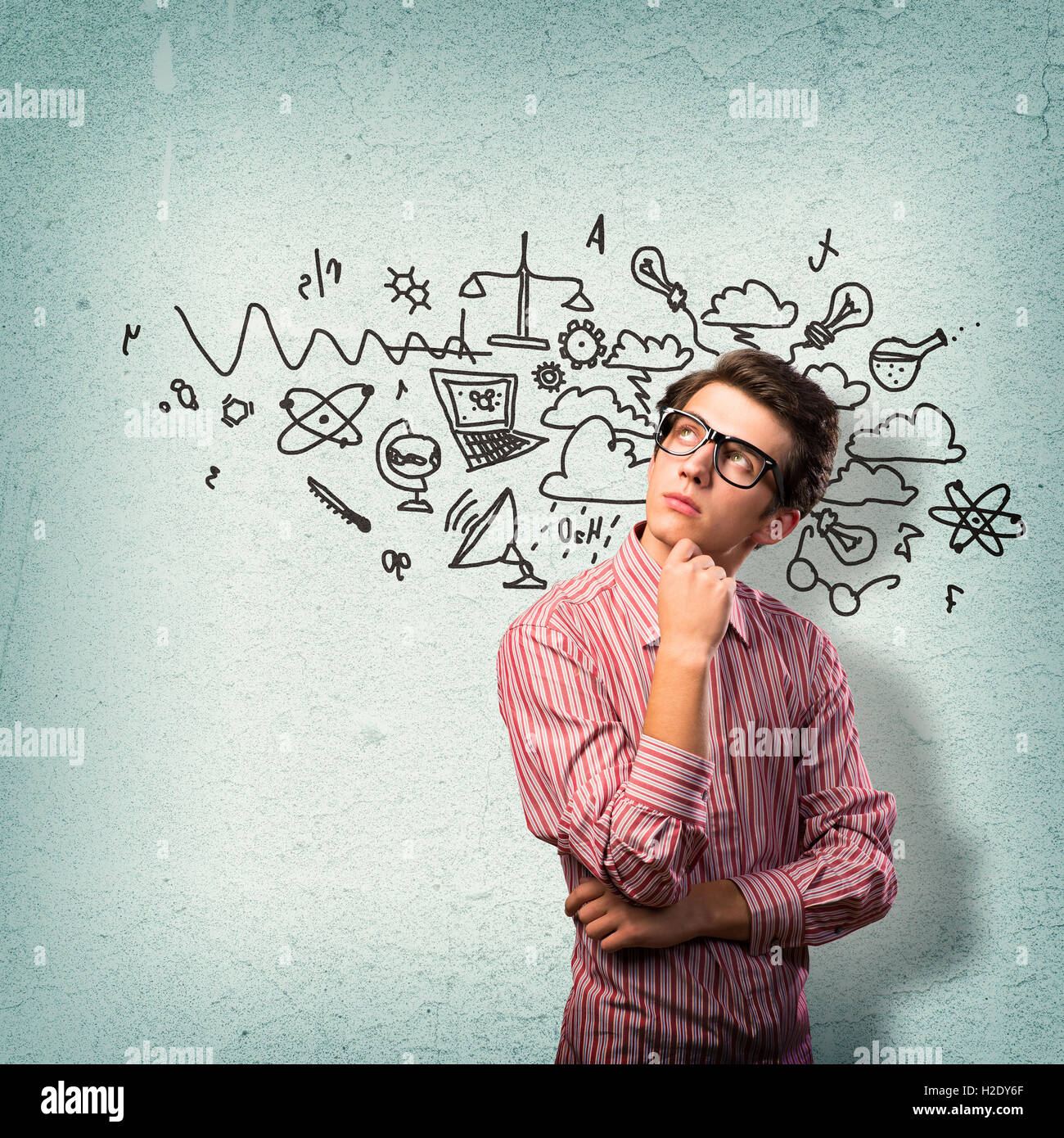 young man scientist with glasses thinking Stock Photo - Alamy