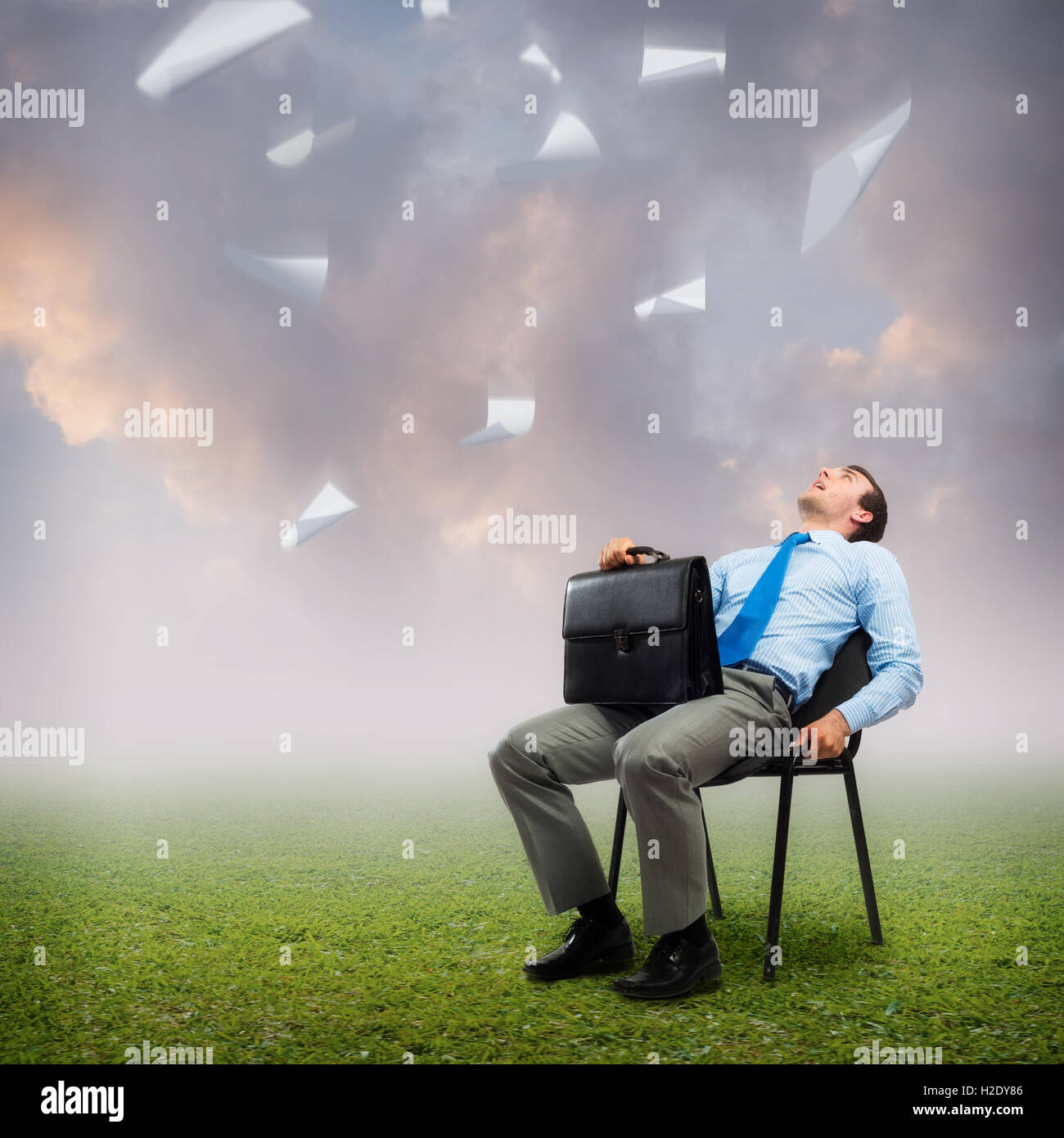 Young business man looking up Stock Photo - Alamy