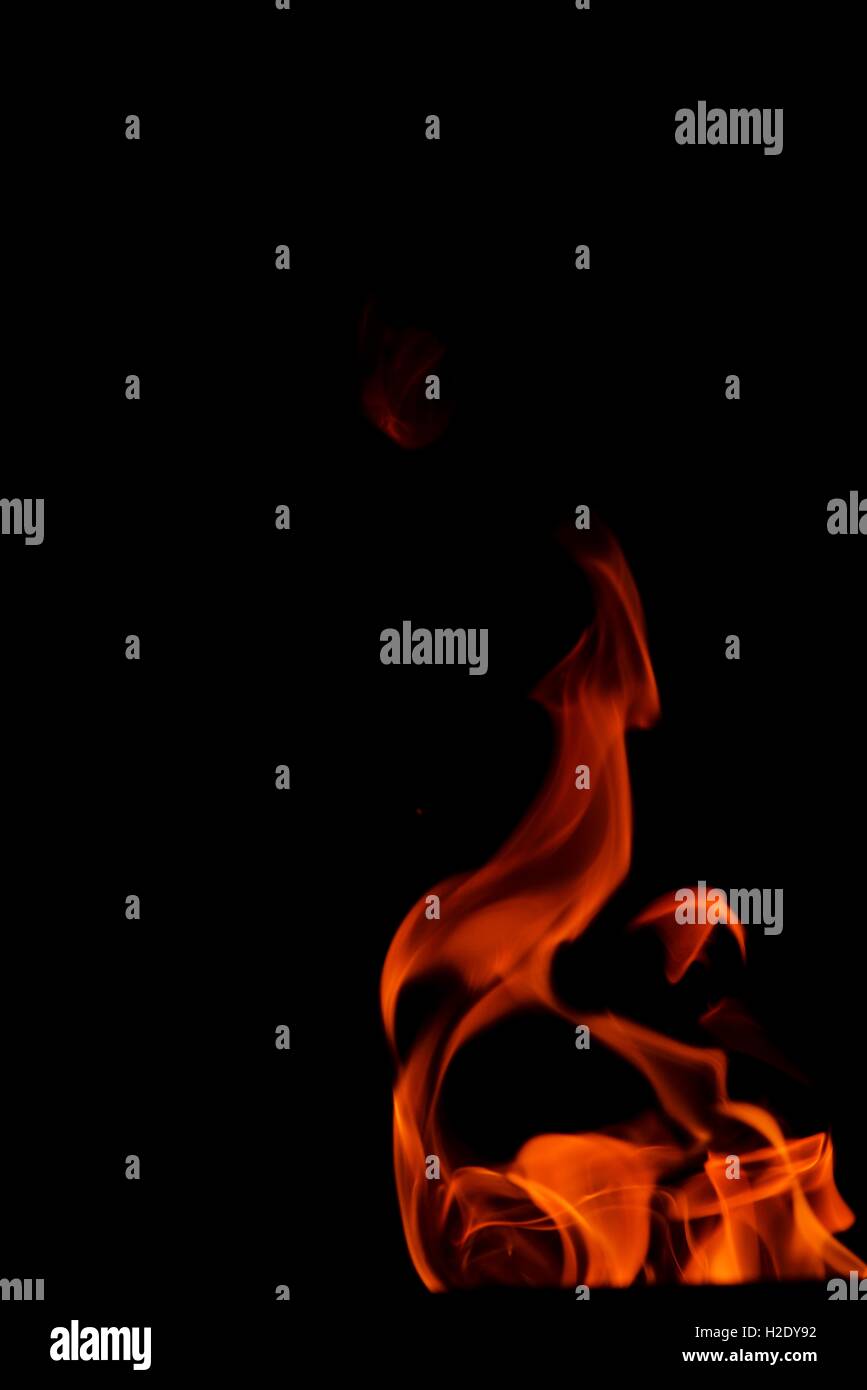 fire flame on black background Stock Photo - Alamy