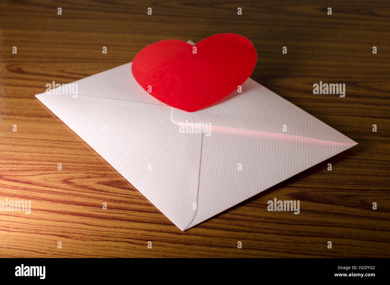 red heart with pink envelope Stock Photo - Alamy