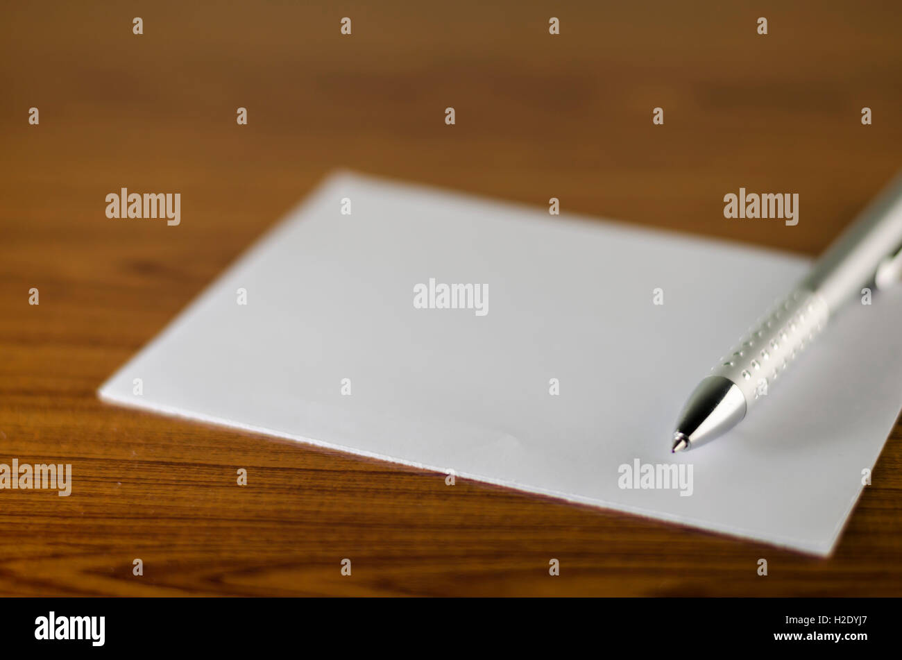 pen with white paper Stock Photo - Alamy