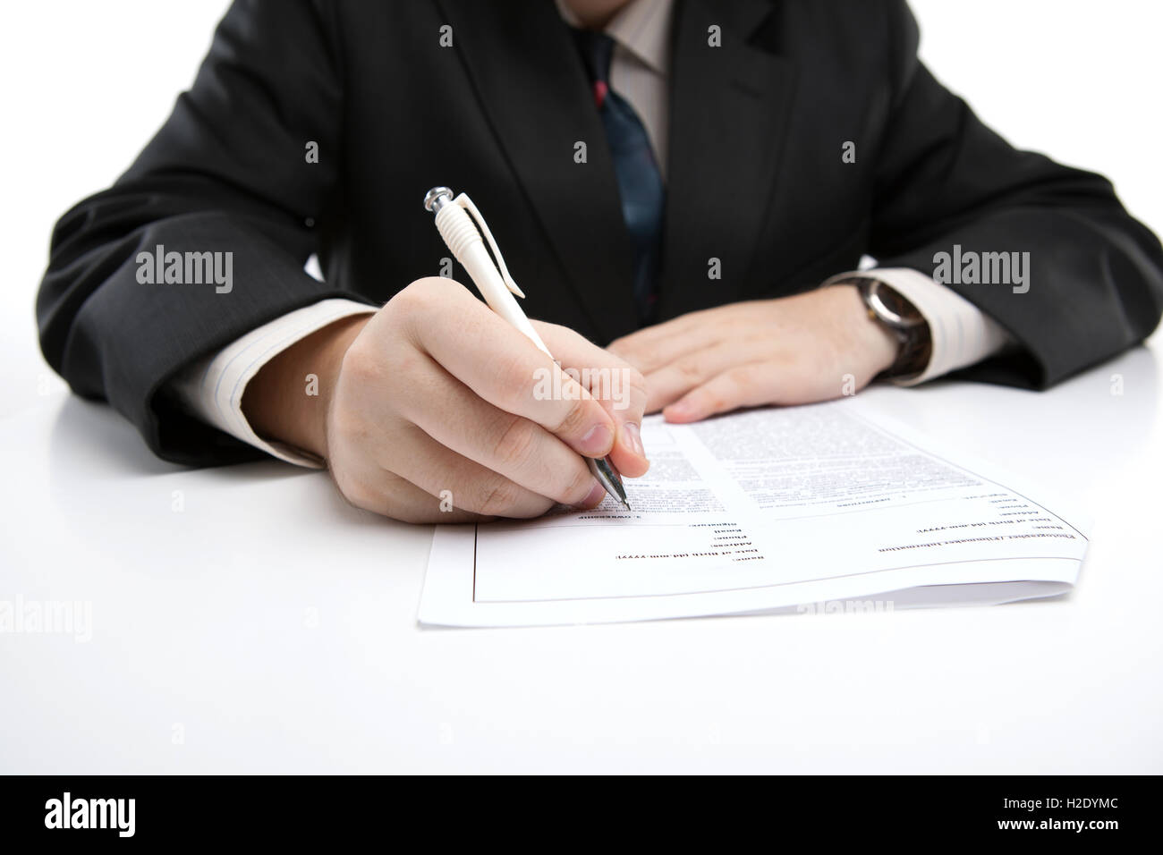 man signing a contract Stock Photo - Alamy