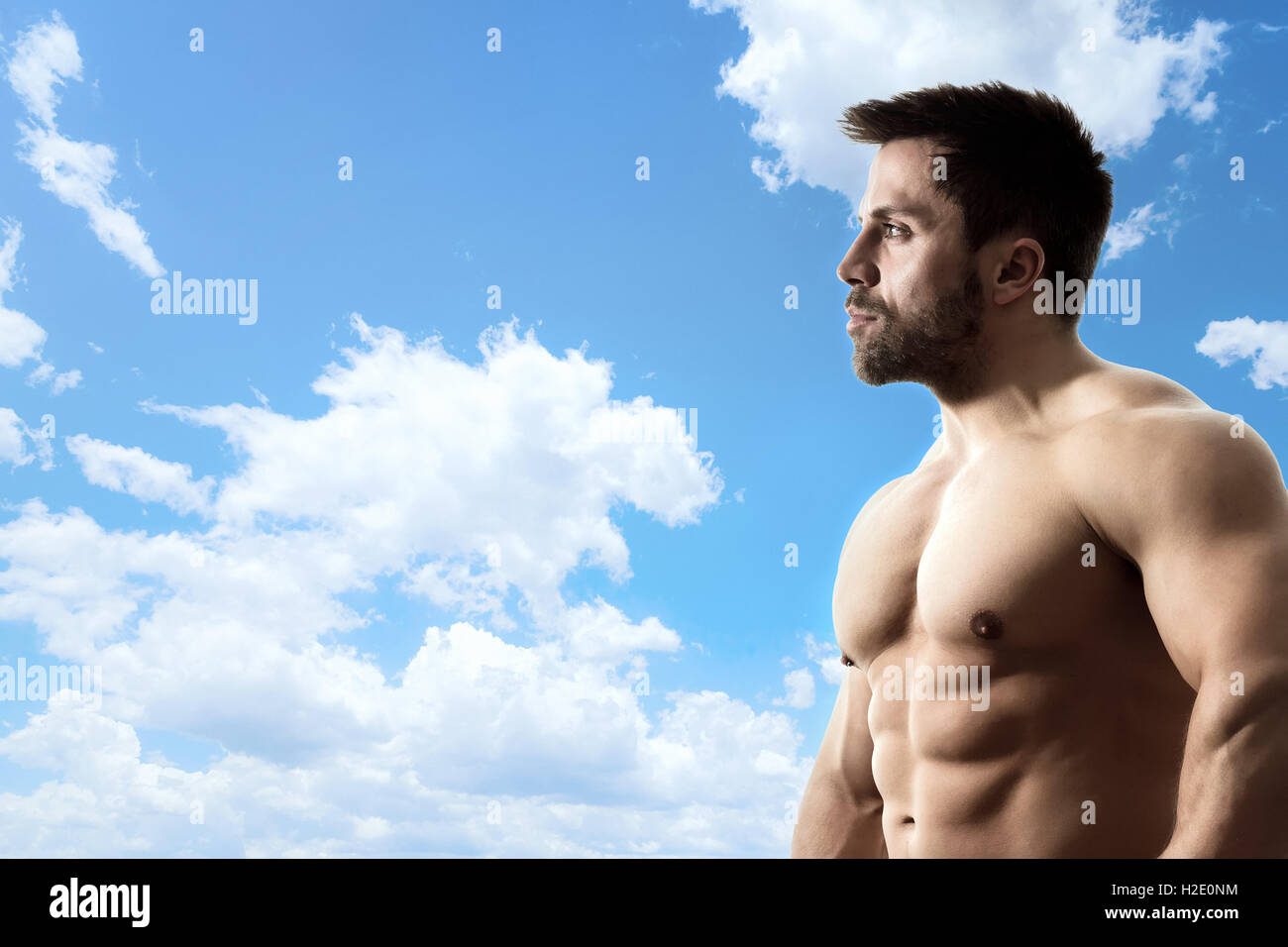 blue sky bodybuilder Stock Photo - Alamy