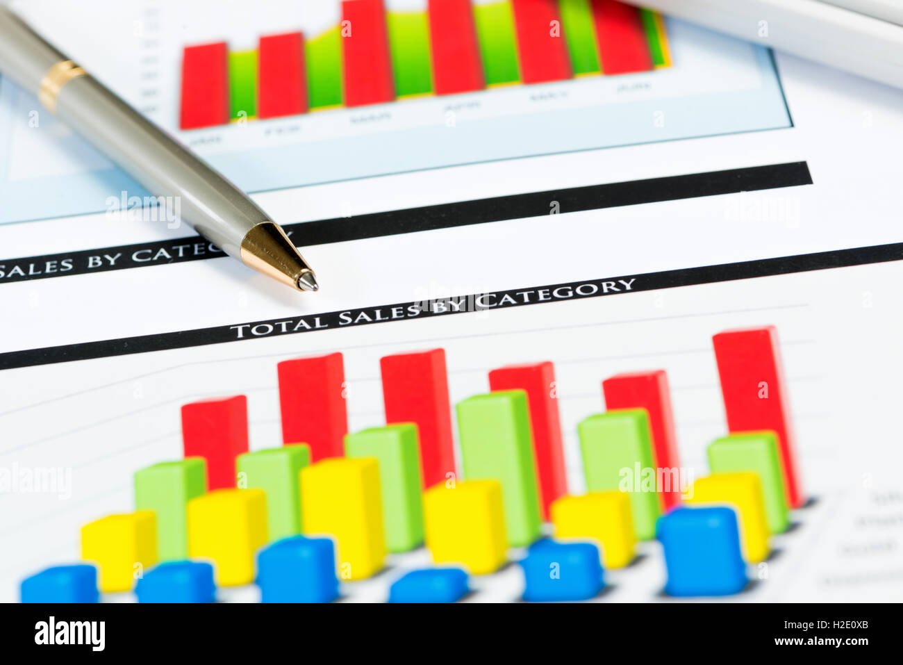 close-up of pen and financial growth charts Stock Photo - Alamy