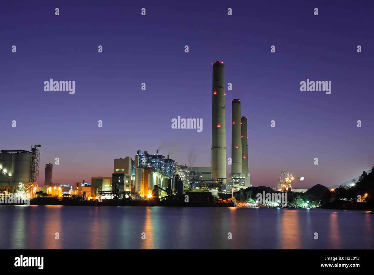 Industrial building at night Stock Photo - Alamy