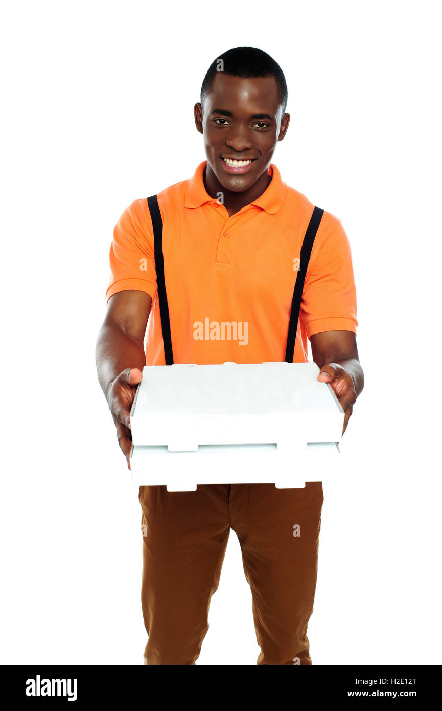 Pizza boy delivering an order Stock Photo - Alamy