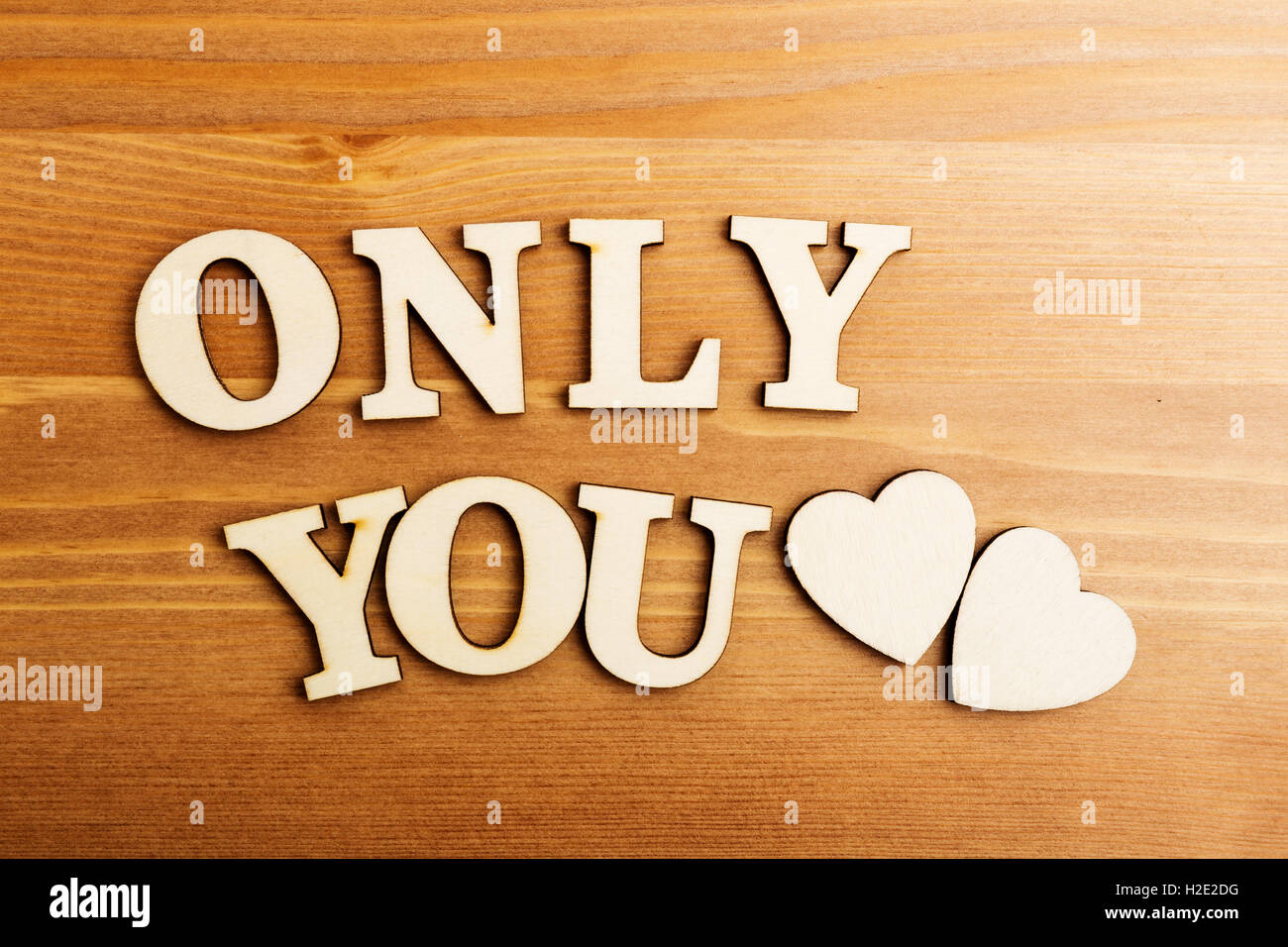 Only You wooden text Stock Photo - Alamy