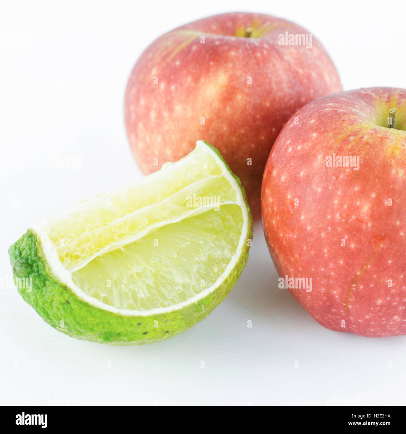 apple and lime isolated on white background Stock Photo - Alamy