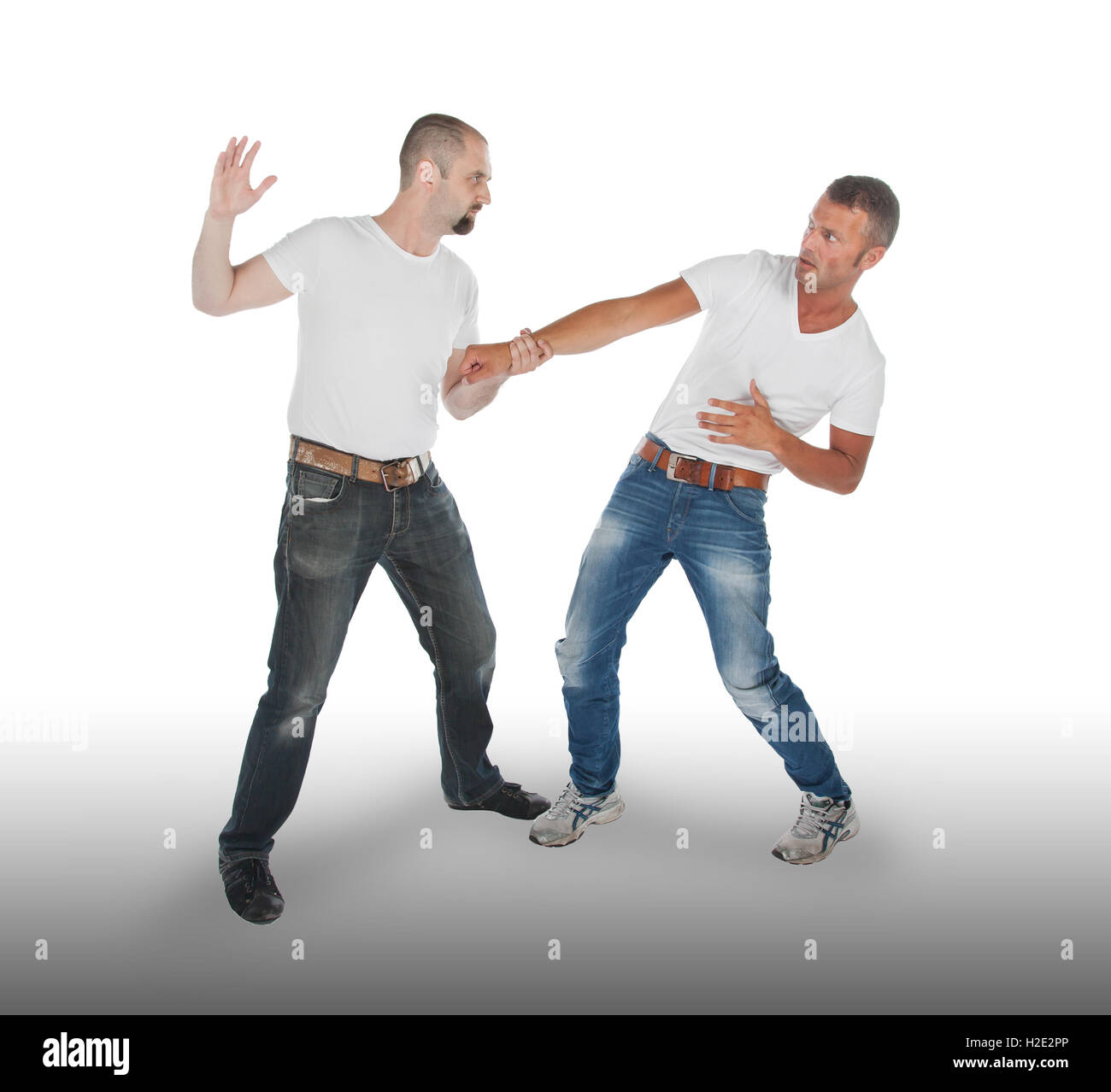 Man attacking other man Stock Photo - Alamy